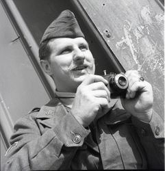 Soldier holding camera — Calisphere