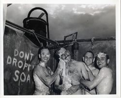 Soldiers goofing off in an outdoor shower — Calisphere