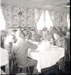 Men eating in a dinning hall at Fort Ord — Calisphere