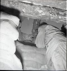 Soldier using a bunker periscope — Calisphere