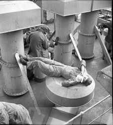 Soldier reading on the USS Meigs — Calisphere