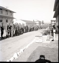 Trainees in line around the barracks at Fort Ord — Calisphere
