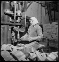 Spool factory Lahti [Woman working] — Calisphere