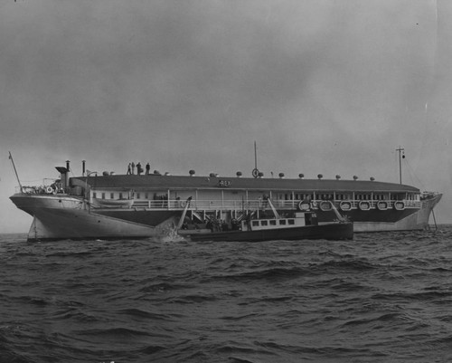 Gambling ship Rex employees stop police raid with fire hoses — Calisphere