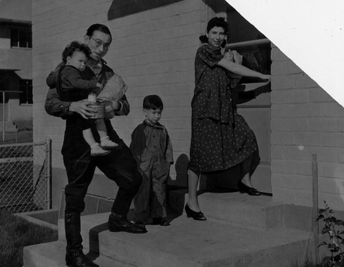 First family to move into Ramona Gardens housing project — Calisphere