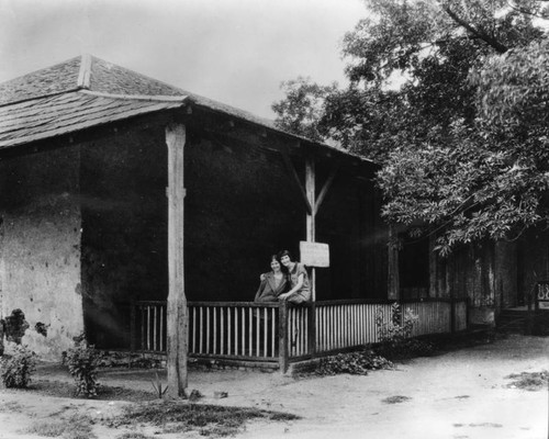 Two women on Pio Pico adobe patio — Calisphere