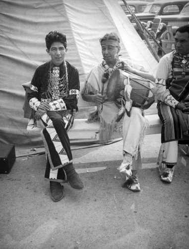 Bench in front of a tepee at the Farmers Market Fall Festival — Calisphere
