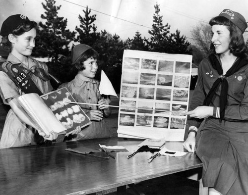 Girls set up for Skill-O-Rama — Calisphere