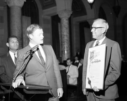 Billy Mills and Art Snyder present resolution to Dr. Everett B. Chaffee ...