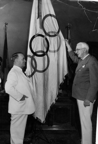 Shaw and Garland with Olympic flag — Calisphere