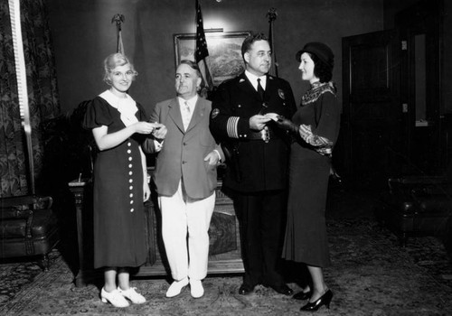 Mayor Frank Shaw buying tickets — Calisphere