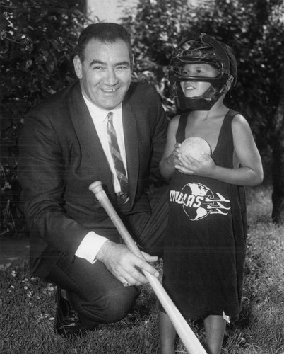 John Ferraro with young ball player — Calisphere