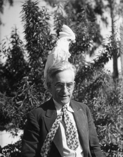 Man with cockatoo — Calisphere