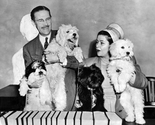 Assistant city attorney Perry Thomas and Mrs. Donald Garfield — Calisphere