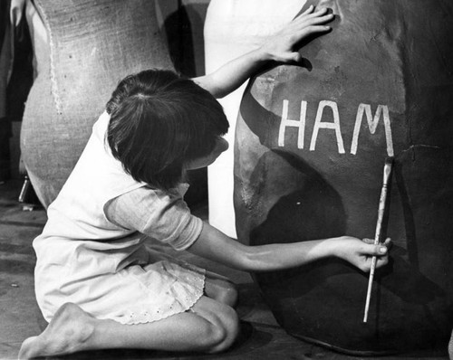 A little girl's day as a ham to work and... then to sleep — Calisphere