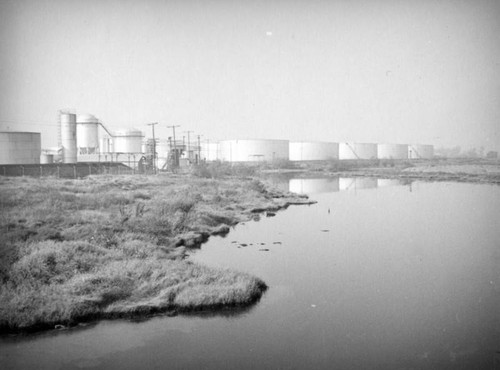 Texaco storage tanks by the water — Calisphere