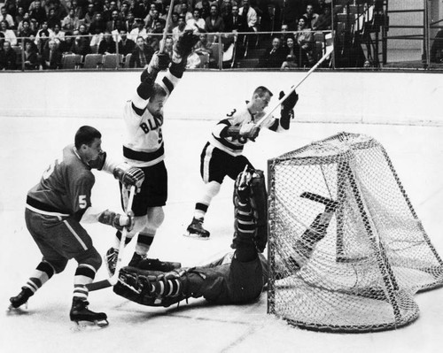 Blades' Bruce Carmichael (9) and Lloyd Haddon (3) cheer Leo Labine's ...