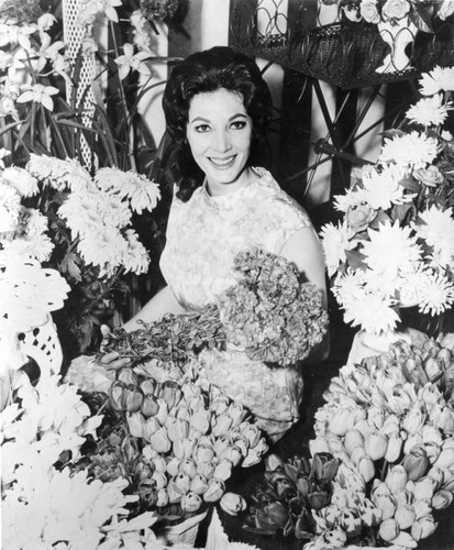 Miss flower girl' surrounded by blooms — Calisphere