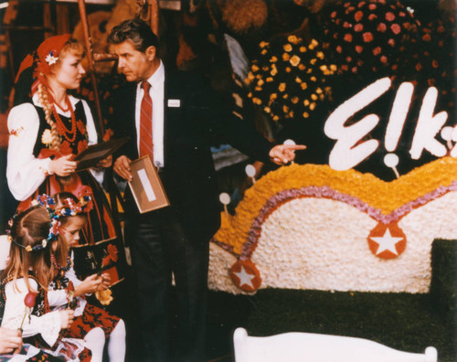 Polish folk dancers by Rose Parade float — Calisphere