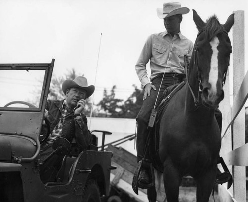 Rex Allen and cowboy on a horse — Calisphere
