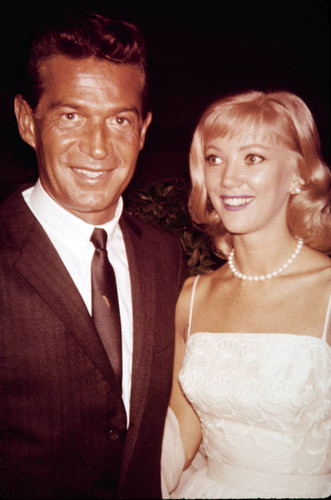 George Nader attends a premiere — Calisphere