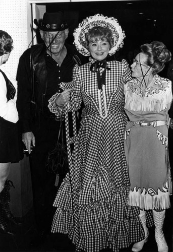 Lucille Ball, Gary Morton, and DeDe Ball at a SHARE benefit — Calisphere