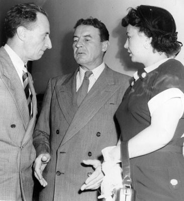[Attorney Vincent Hallinan, center, chats with Harry Bridges and Mrs ...