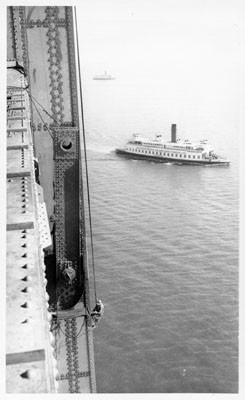 [Bridge worker hanging by rope from the side of the San Francisco ...