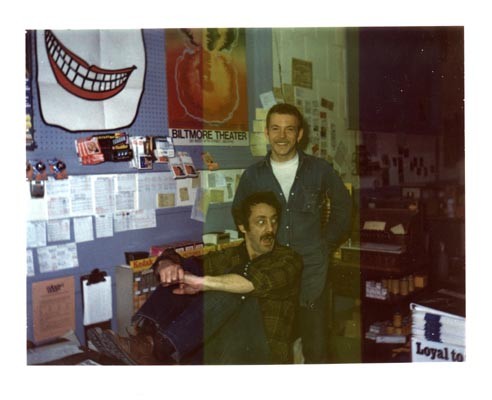 [Harvey Milk (seated) and Scott Smith in Castro Camera] — Calisphere