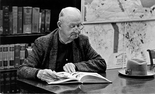 [Library patron reading in the Main Library's History Department ...
