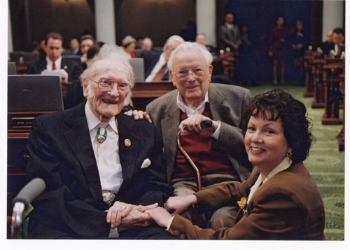 Ralph C. Dills with others in assembly chamber — Calisphere