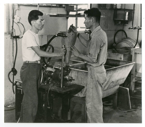 Frank Hirosawa and Joe Nishimura operating mill — Calisphere