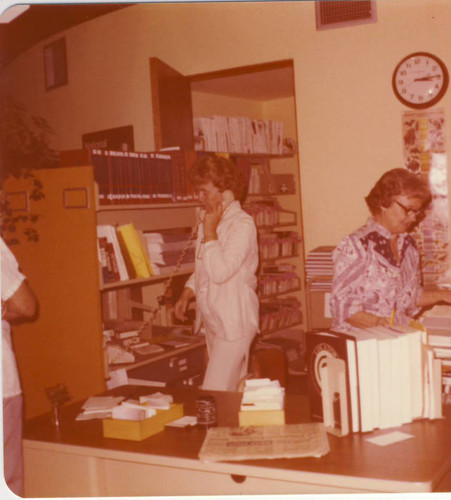 University Park Library's reference desk, 1975 — Calisphere