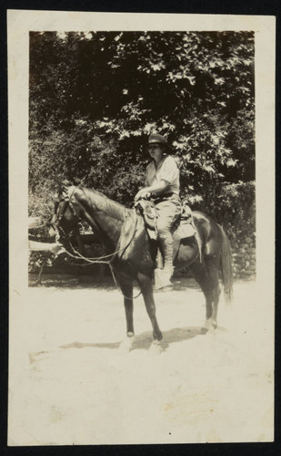 Woman riding a horse — Calisphere