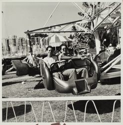 Mothers and daughters take a ride at the Sonoma County Fair carnival ...