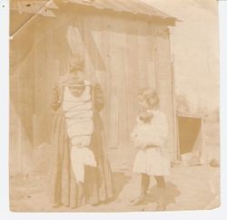 Native American Pomo woman with child on papoose board — Calisphere