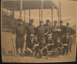 Sebastopol baseball team standing in front of a small stadium, about ...
