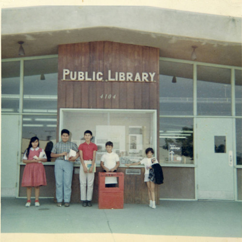Martinez siblings and friends outside City Terrace Library — Calisphere