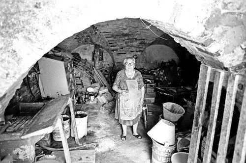 Woman in strage room — Calisphere