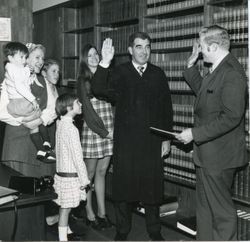 Judge Merrick being sworn in County Deputy Michael Collins — Calisphere