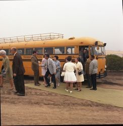 Guests arriving by bus at the dedication of Malibu campus and William ...