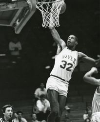 Basketball player Dwayne Polee at the net, circa 1985 — Calisphere
