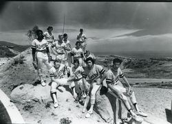 Wave baseball team posing on a knoll overlooking the Pacific, early ...