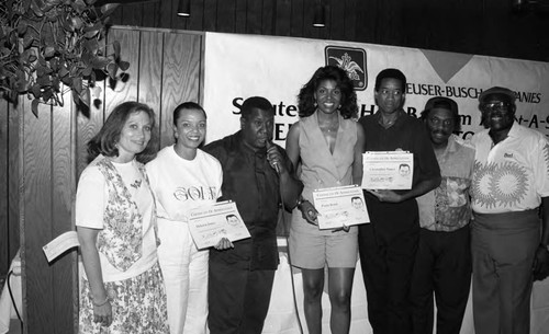 Deloria Jones, Paula Bond, and Christopher Nance holding certificates ...