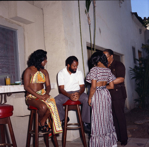 Judy Pace Flood and Berry Gordy at his party, Los Angeles — Calisphere
