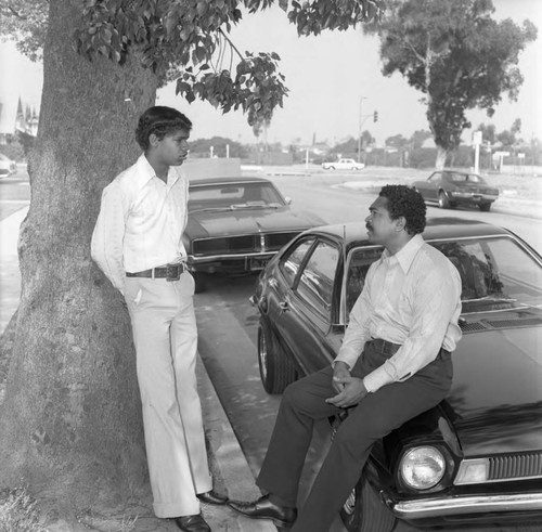 Mervyn Dymally talking with his son Mark Dymally, Los Angeles, 1973 ...
