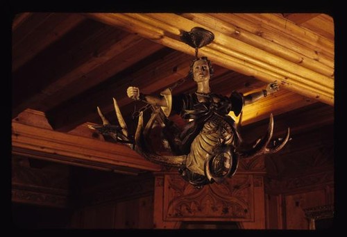 Wyntoon, Cinderella House, interior, antler chandelier, wood carving ...
