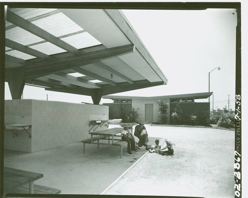 View of comfort station and picnic area at Ted Watkins Park — Calisphere