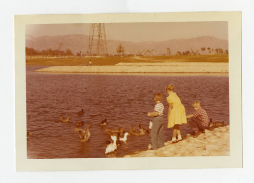 Poteet children feeding ducks at Legg Lake, Whittier Narrows Recreation ...