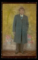 Clabon Wise wearing suit and coat, 1950s — Calisphere
